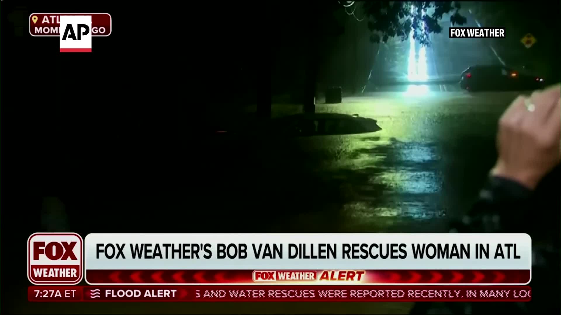 A TV reporter was doing a live hurricane report when he rescued a woman ...